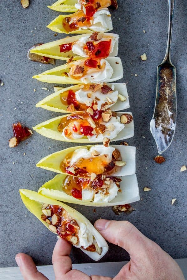 Smokey Almond Cream Cheese Endive Bites - The Food Charlatan